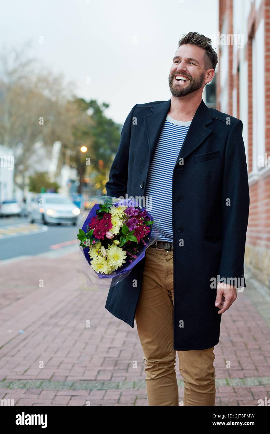 Man hand with flowers hi-res stock photography and images - Alamy