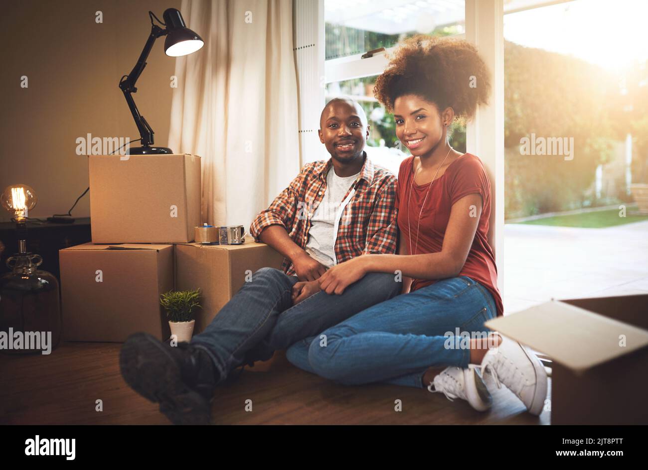 Our happy little nest. Portrait of a young couple taking a break while ...