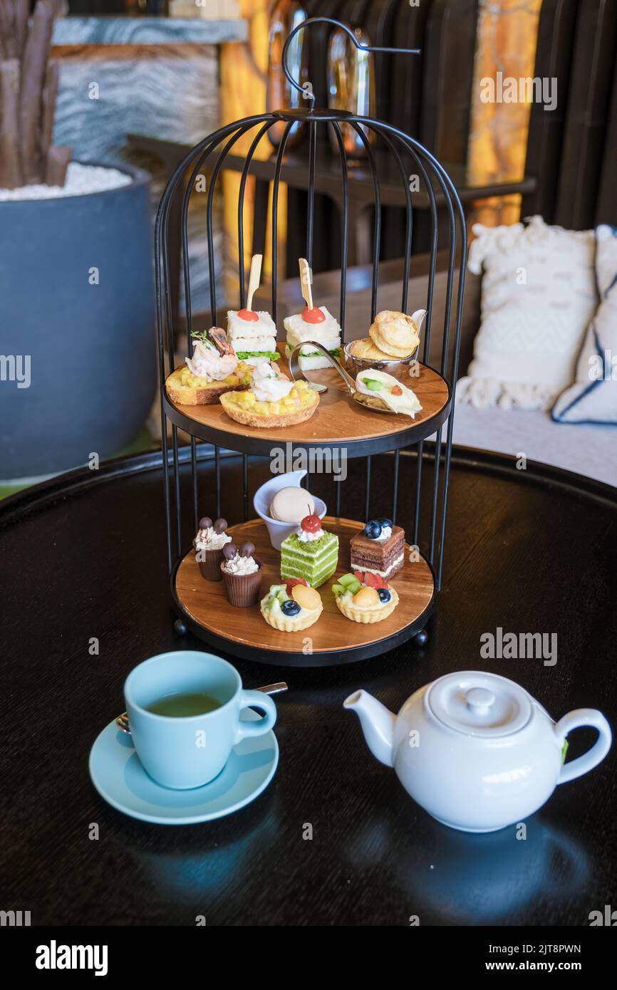 Luxury high tea with snacks and tea in a luxury hotel Stock Photo - Alamy