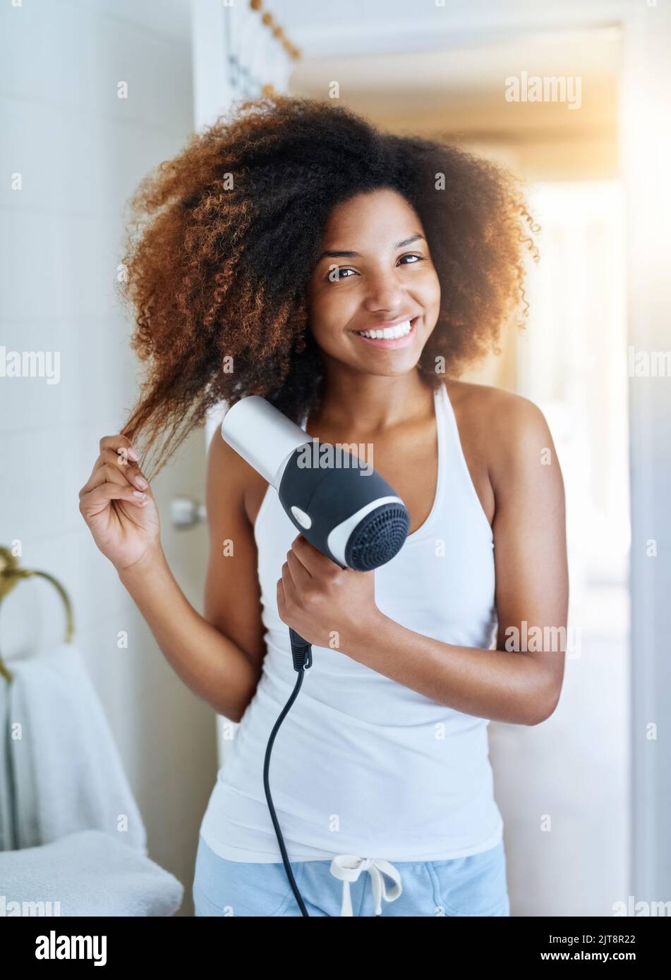 Women drying their hair hi-res stock photography and images - Alamy