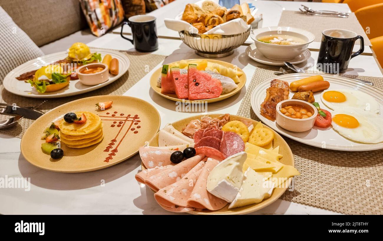Breakfast buffet in a luxury hotel. top view of breakfast table with ...