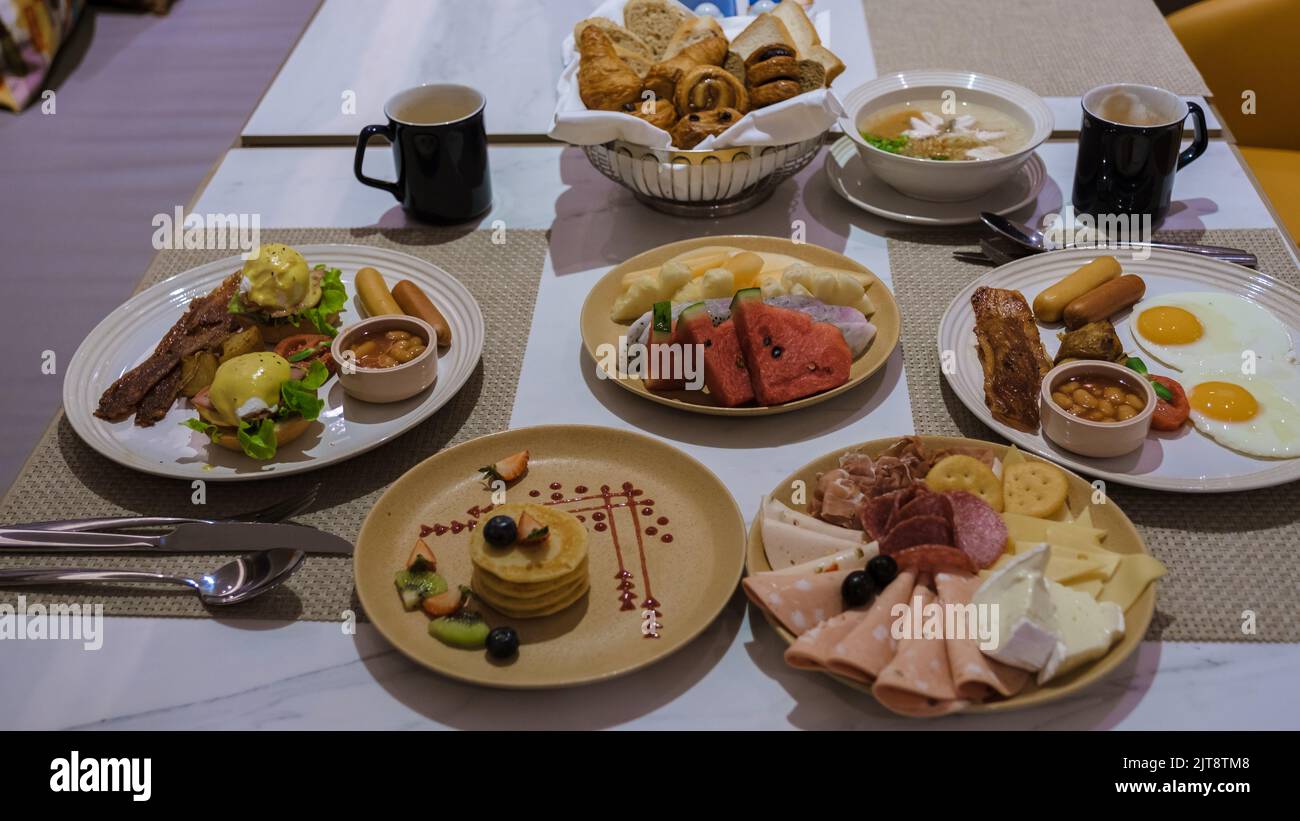 Breakfast buffet in a luxury hotel. top view of breakfast table with ...