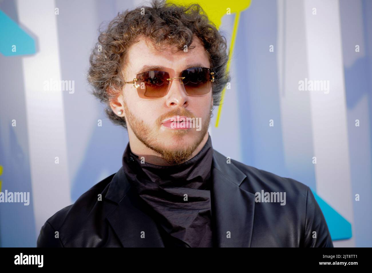 Jack Harlow walking on the black carpet at the 2022 MTV Video Music ...