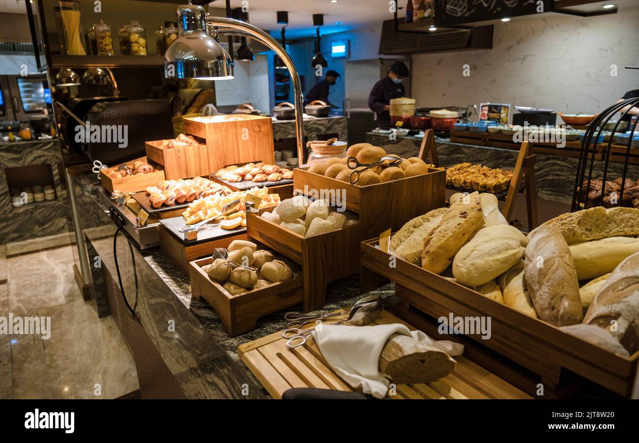 Breakfast buffet in a luxury hotel. bread corner with croissant muffin ...