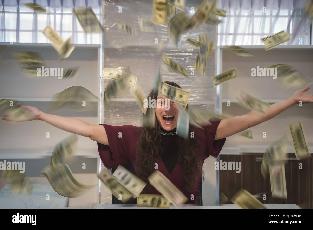businesswoman crazy about money concept business cash money falling ...