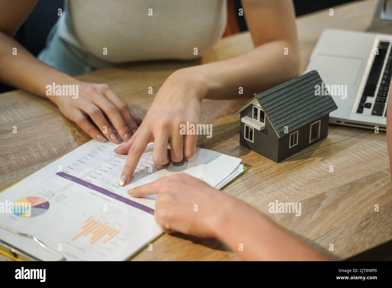Two businesswoman young portrait happy smile and sitting talk teamwork ...
