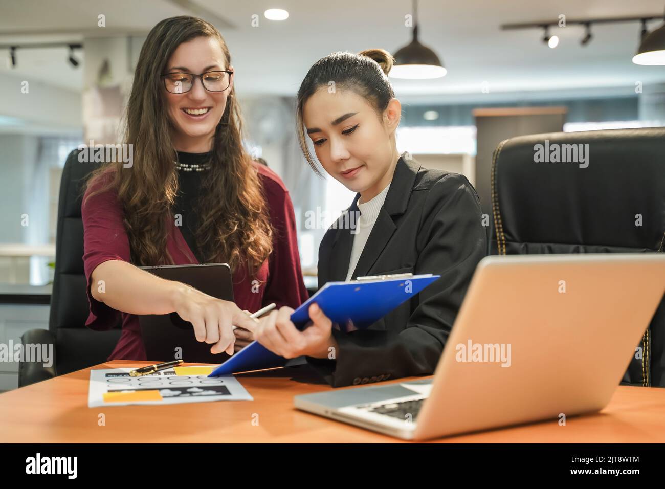Portrait of cheerful young woman professional talking business meeting ...