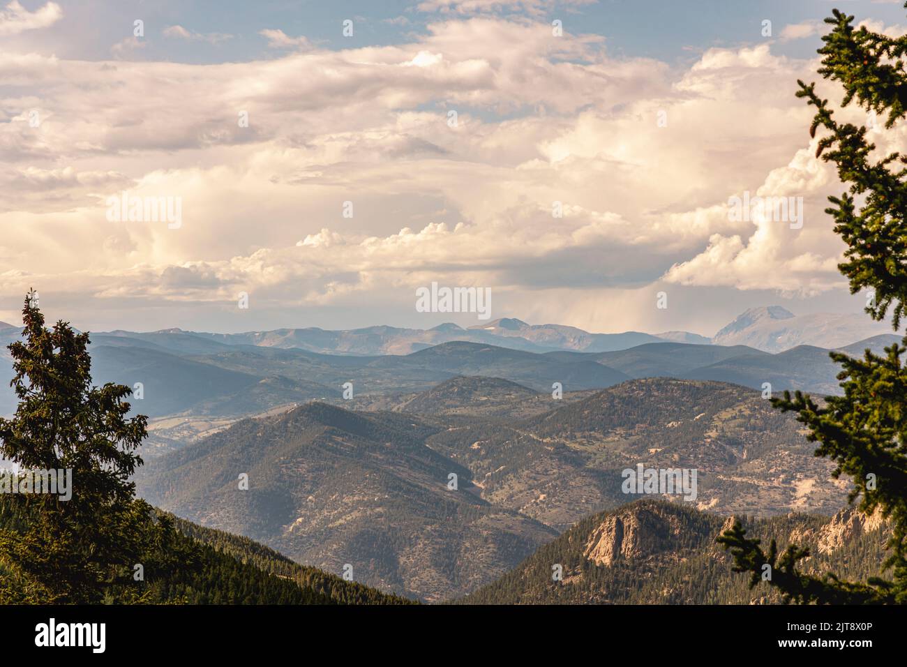 Mountain panorama over the clouds sunset along Squa Pass Road near Echo ...