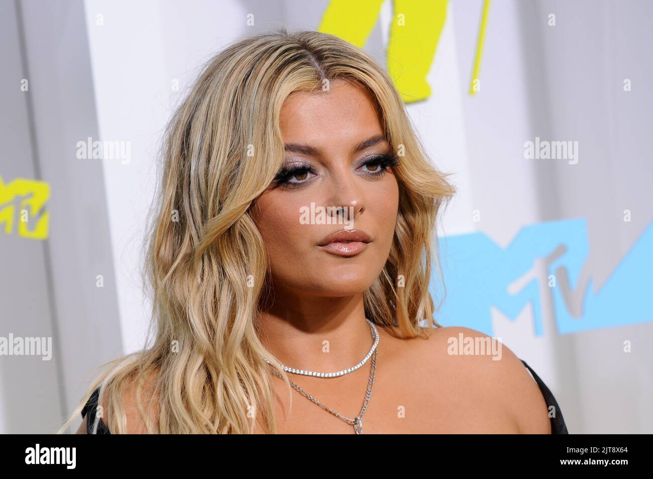 Bebe Rexha walking on the black carpet at the 2022 MTV Video Music ...