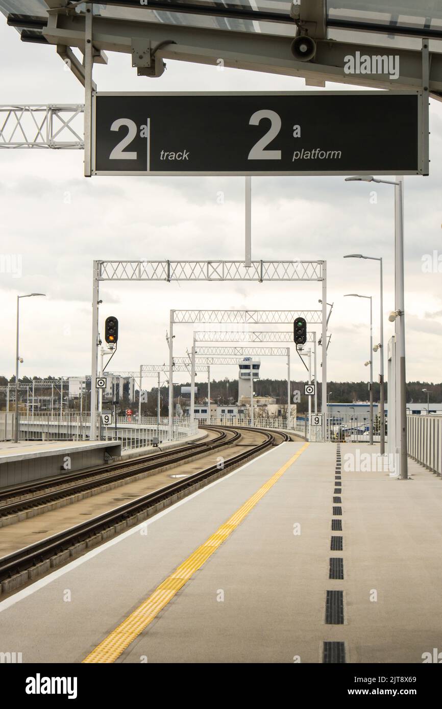 Walk way in train station with no people. Empty Passanger train railway ...