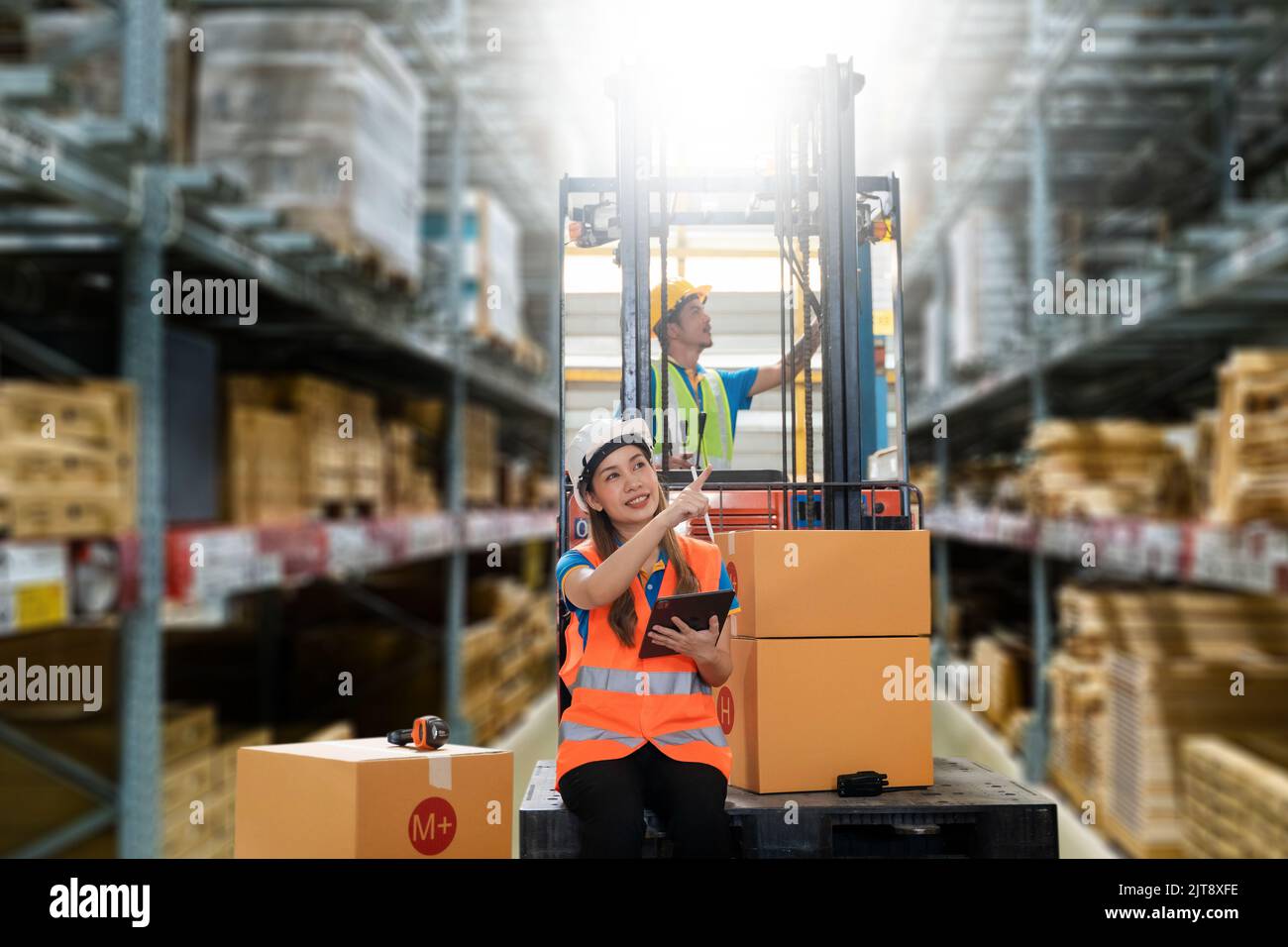Manager using tablet Checke-Commerce Online Orders e-businessonline. In ...