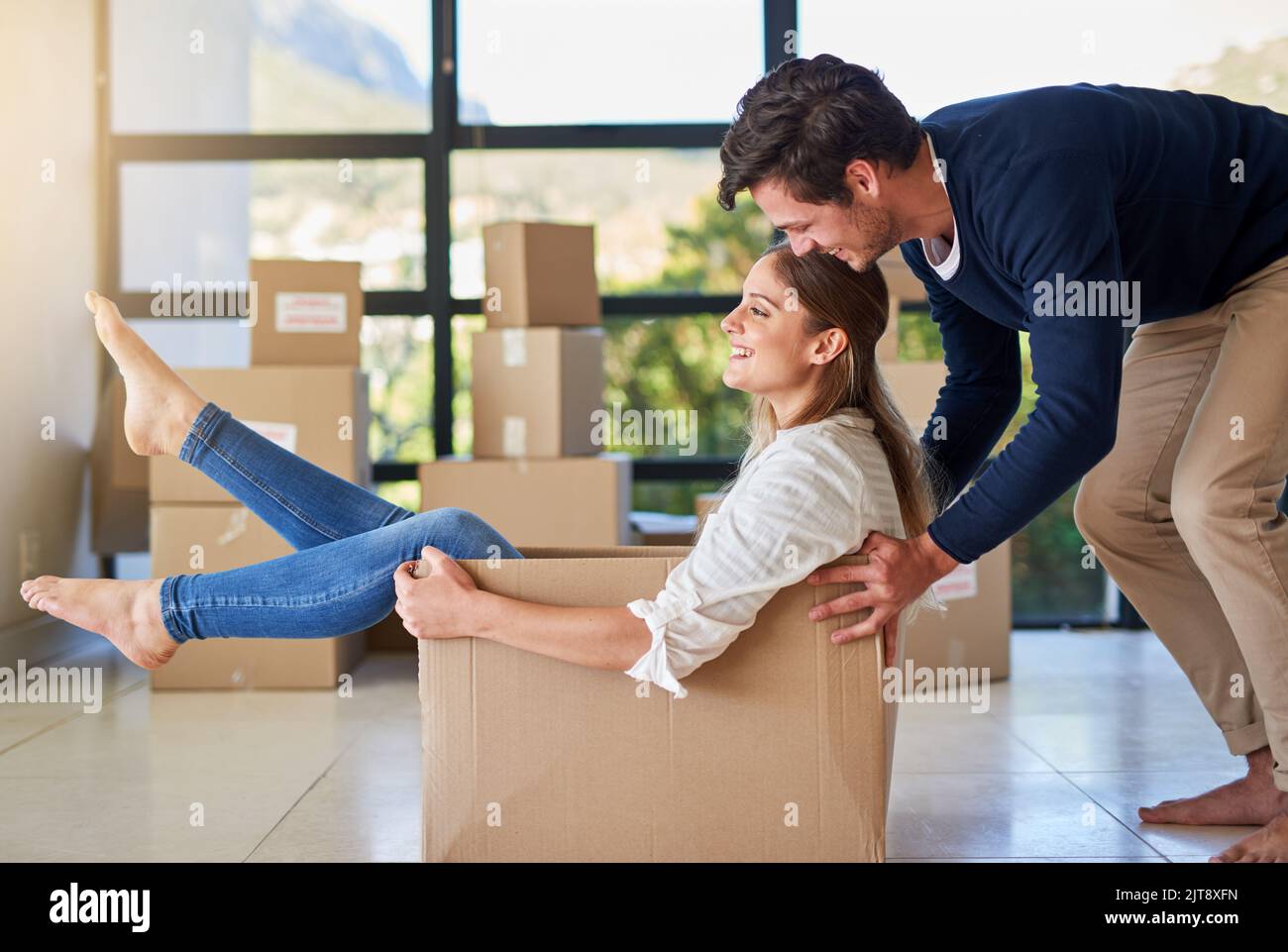 We dont take ourselves too seriously. a young man pushing his ...