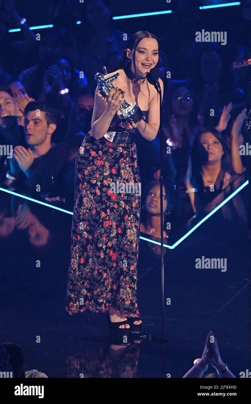 Dove Cameron accepts the Best New Artist award on stage at the MTV ...