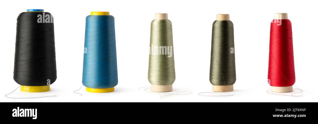 spool of colorful color sewing thread used in fabric and textile ...