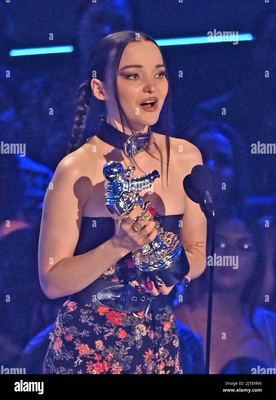 Dove Cameron accepts the Best New Artist award on stage at the MTV ...
