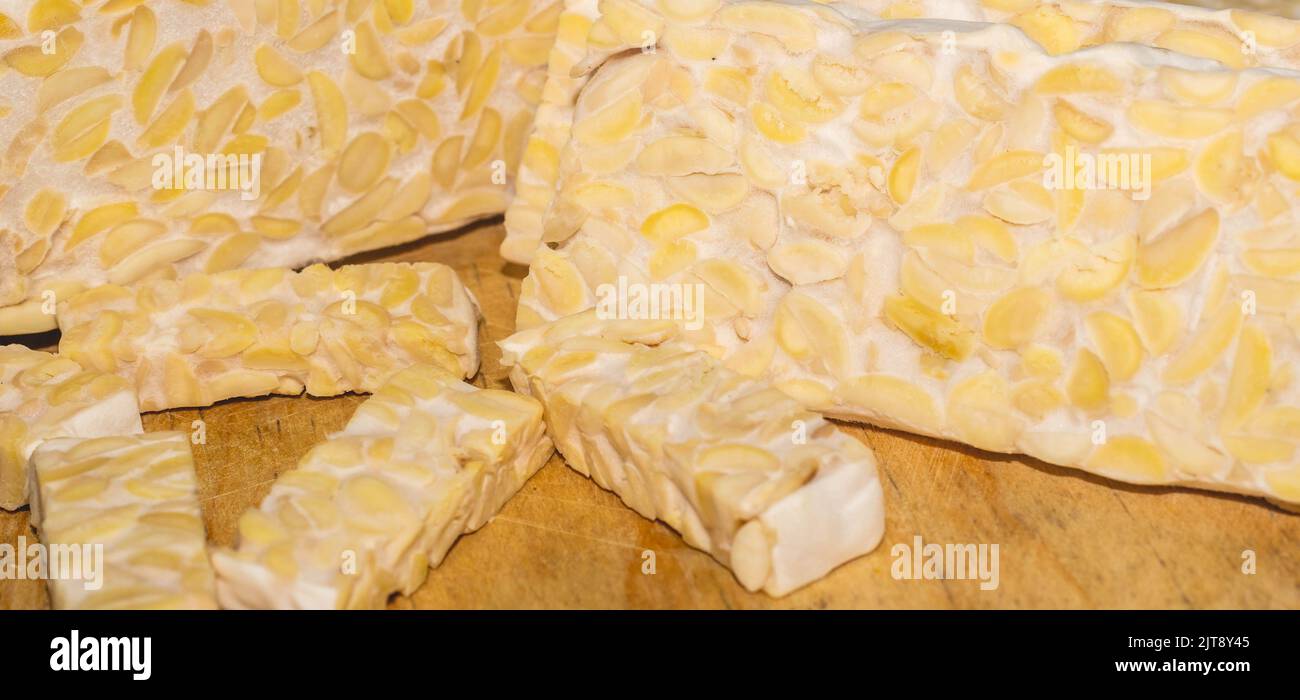 Raw slices of Tempeh, typical Indonesian food fermented made from ...