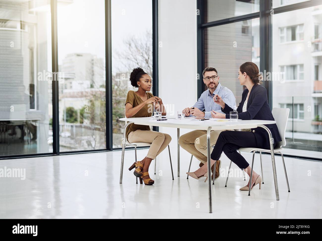 Brainstorming for ideas for their project. a group of businesspeople ...