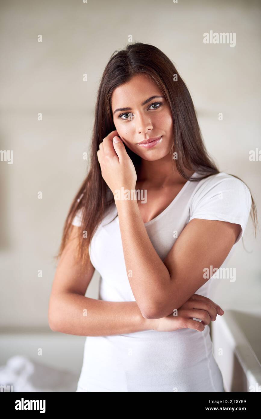 Comfortable in my own skin. Portrait of a beautiful young woman ...