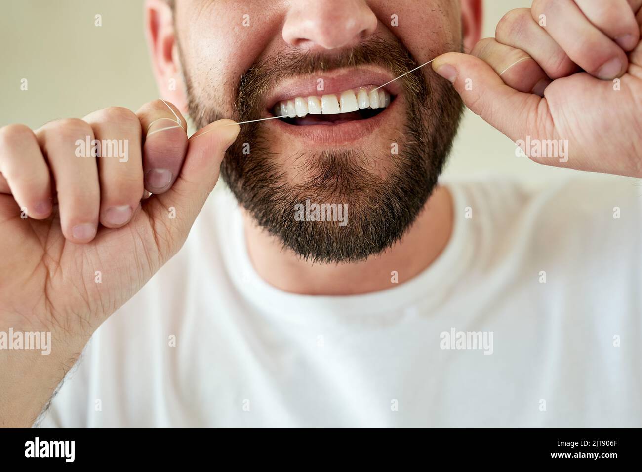 Cleanliness is next to godliness. a handsome young man going through is ...