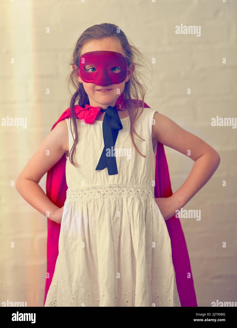 If ever youre danger, you know who to call. Portrait of a little girl ...