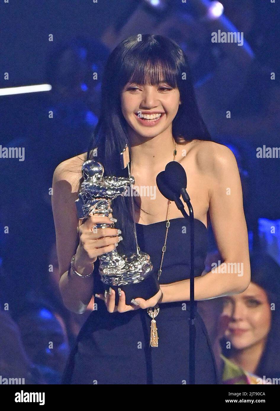 Lisa accept the award for best K-Pop for "Lalisa" on stage at the MTV ...