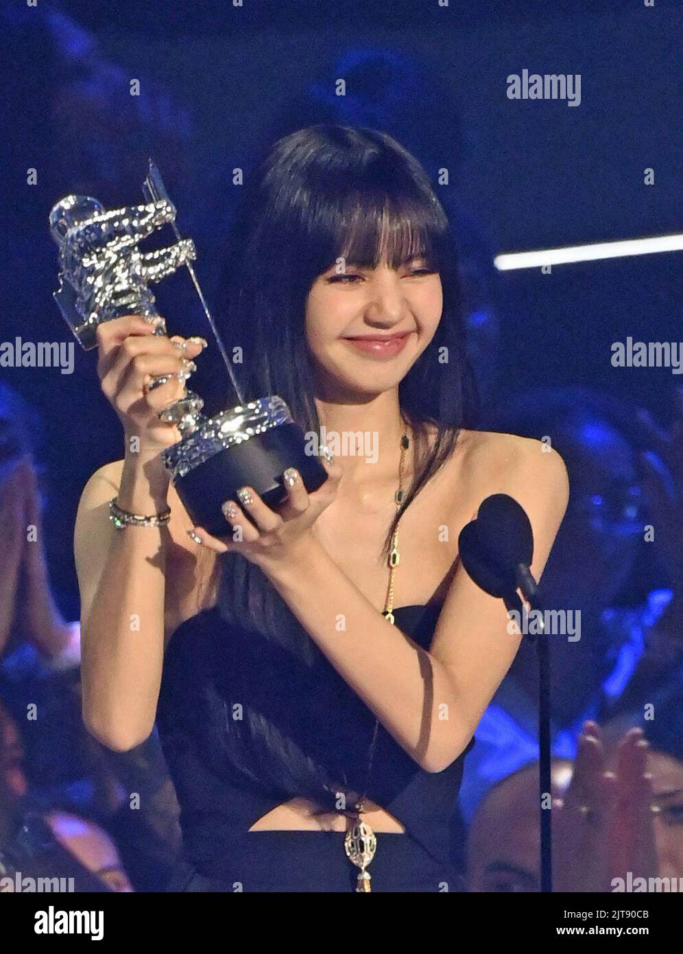 Lisa accept the award for best K-Pop for "Lalisa" on stage at the MTV ...