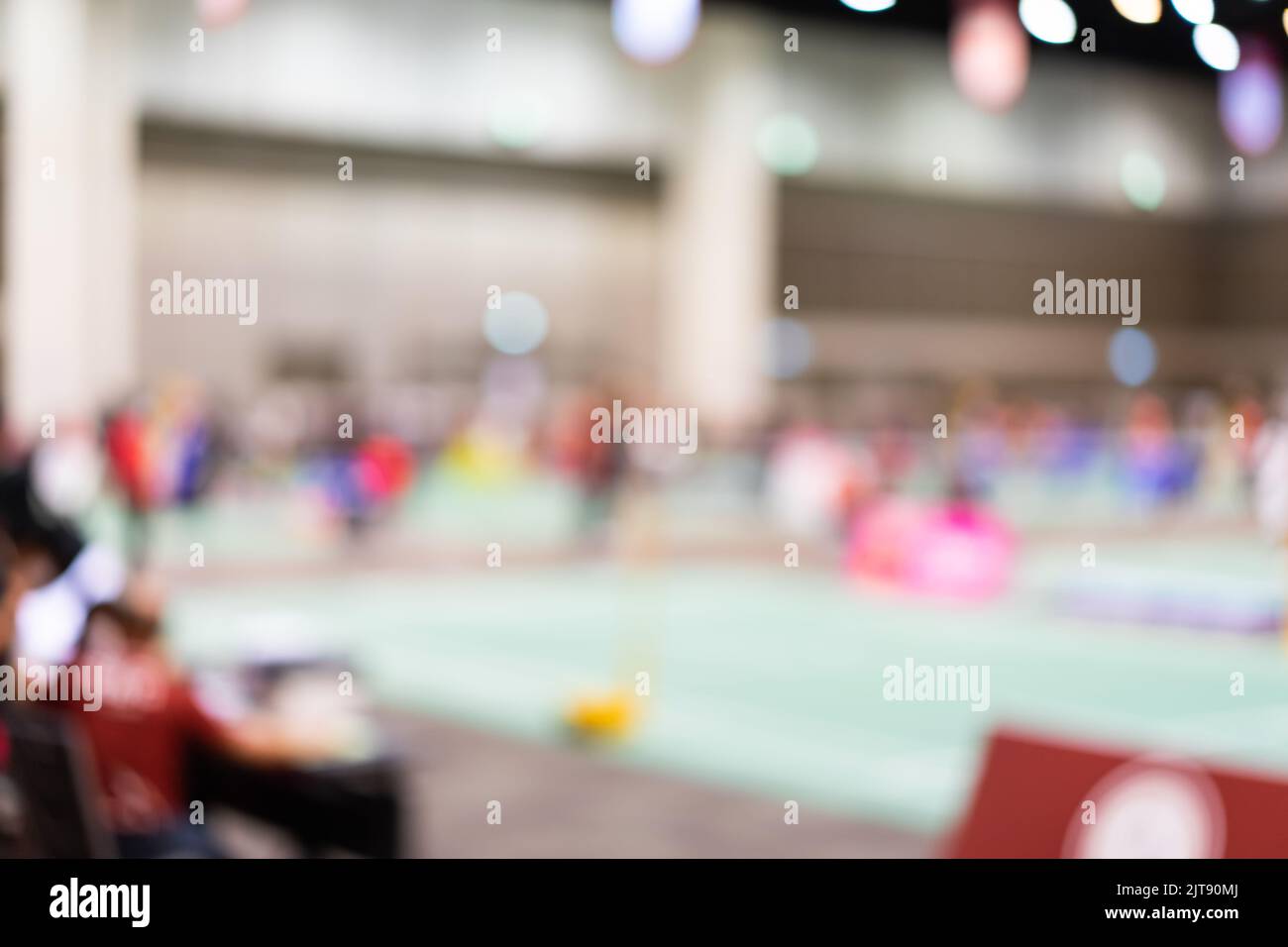 Defocus blurs the background of Badminton tournament competition in ...