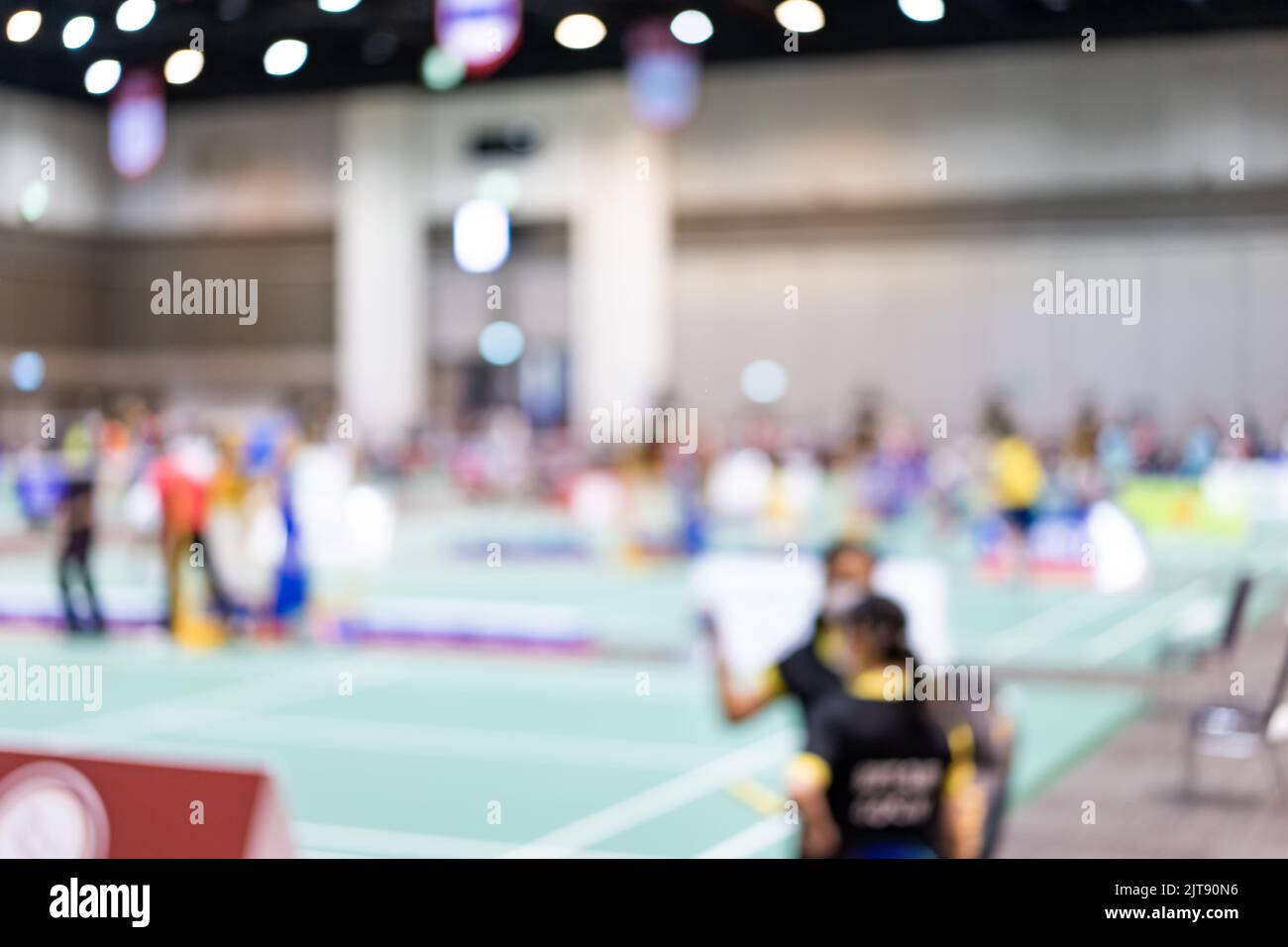 Defocus blurs the background of Badminton tournament competition in ...