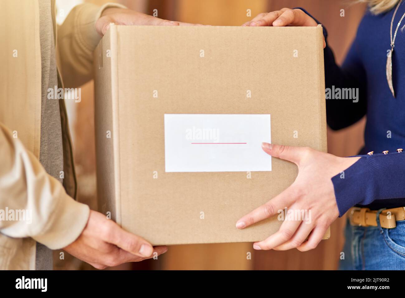 Delivery courier getting cardboard boxes hi-res stock photography and ...
