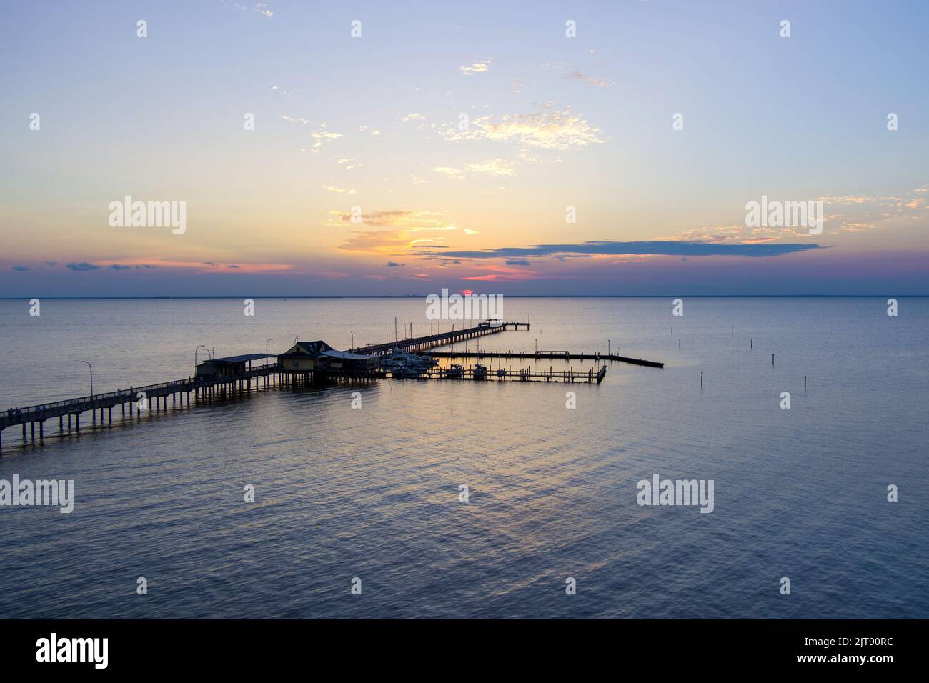 The Fairhope Pier at sunset on Mobile Bay Stock Photo - Alamy
