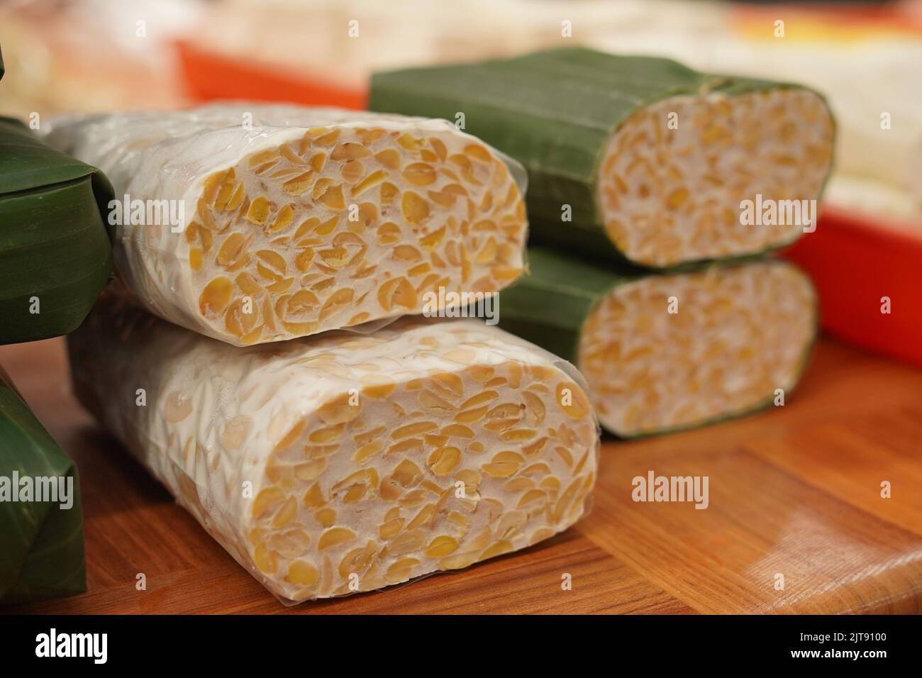 Tempe or tempeh wrapped in banana leaves,is a indonesian traditional ...