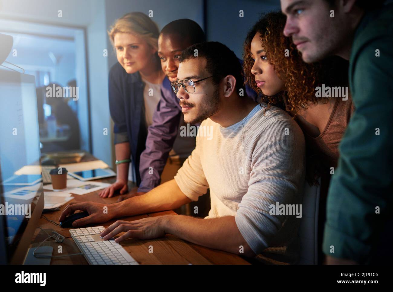 We work better when we work together. a team of young businesspeople ...