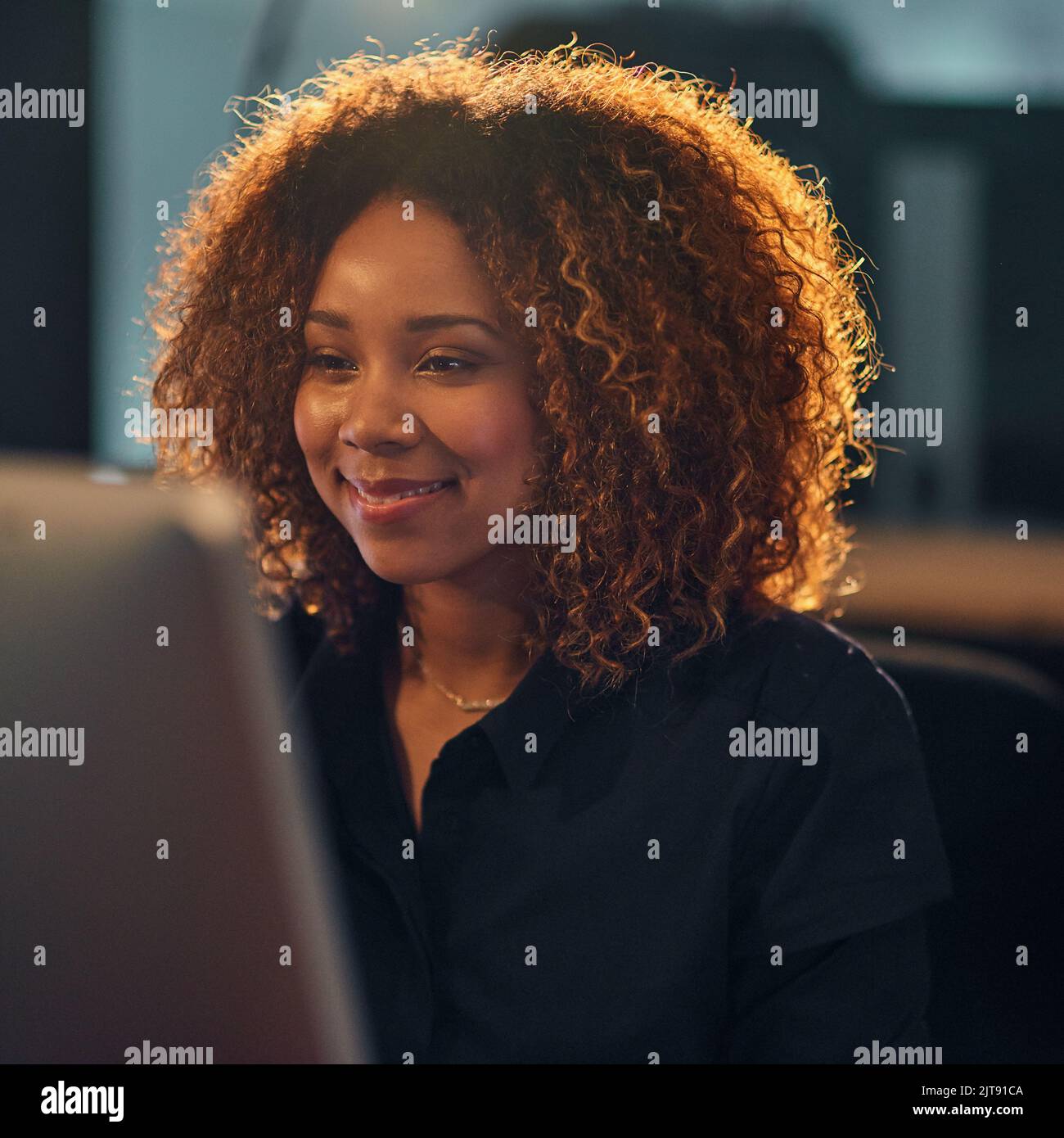Hard work makes great work. a happy young businesswoman using a ...