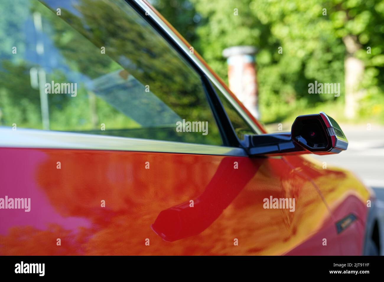 A side view of red car with window Stock Photo - Alamy