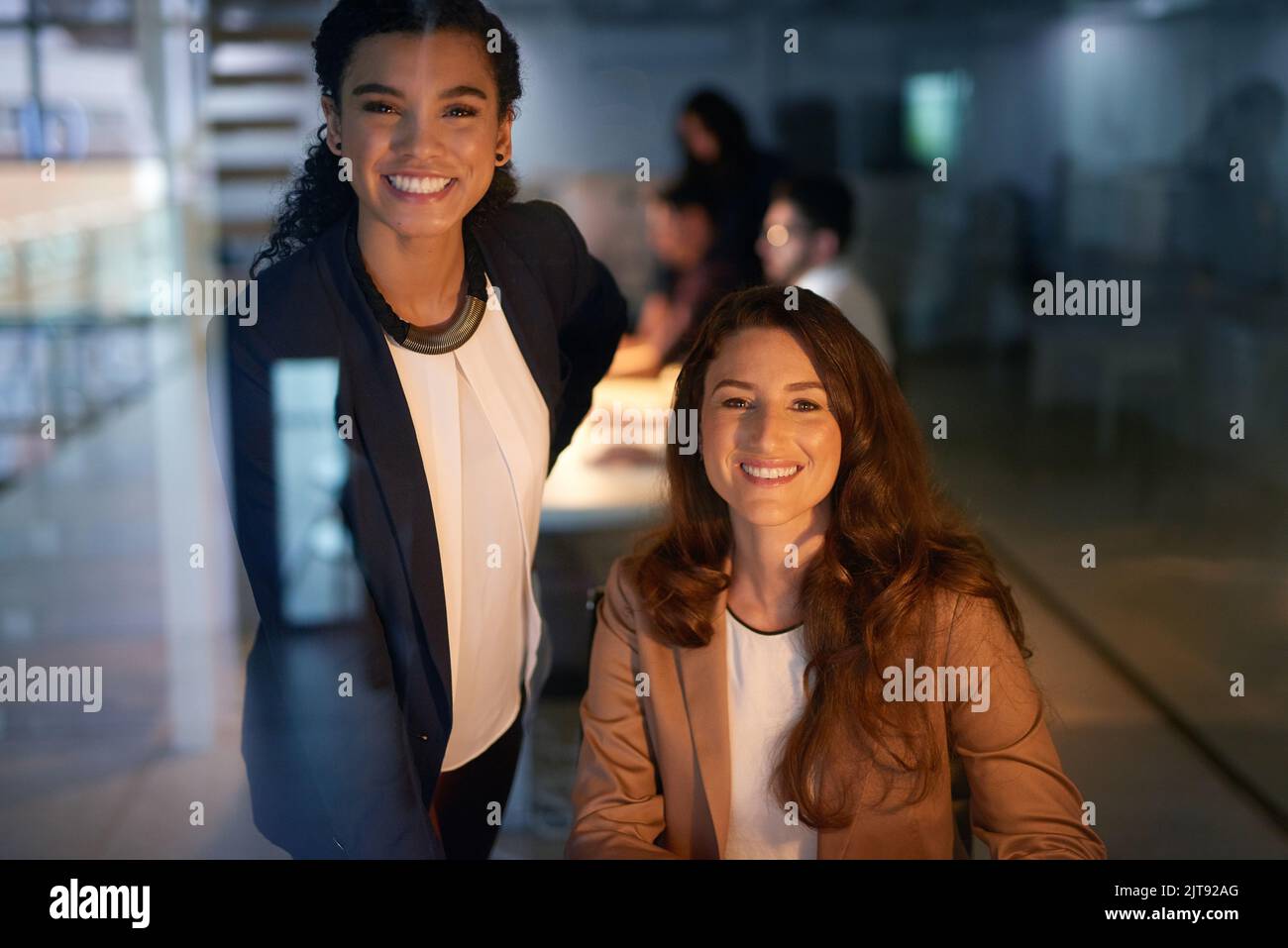 Great things happen when passion meets dedication. Portrait of two ...