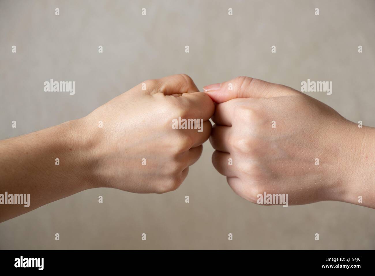 two fists on an isolated background, strength and power, fight and war ...