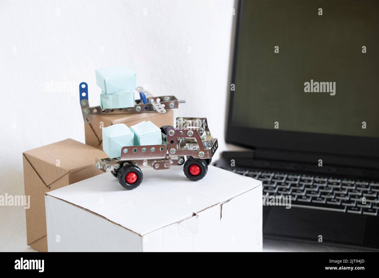 Shipping, delivery and logistic concept. Truck and plane and cardboard ...