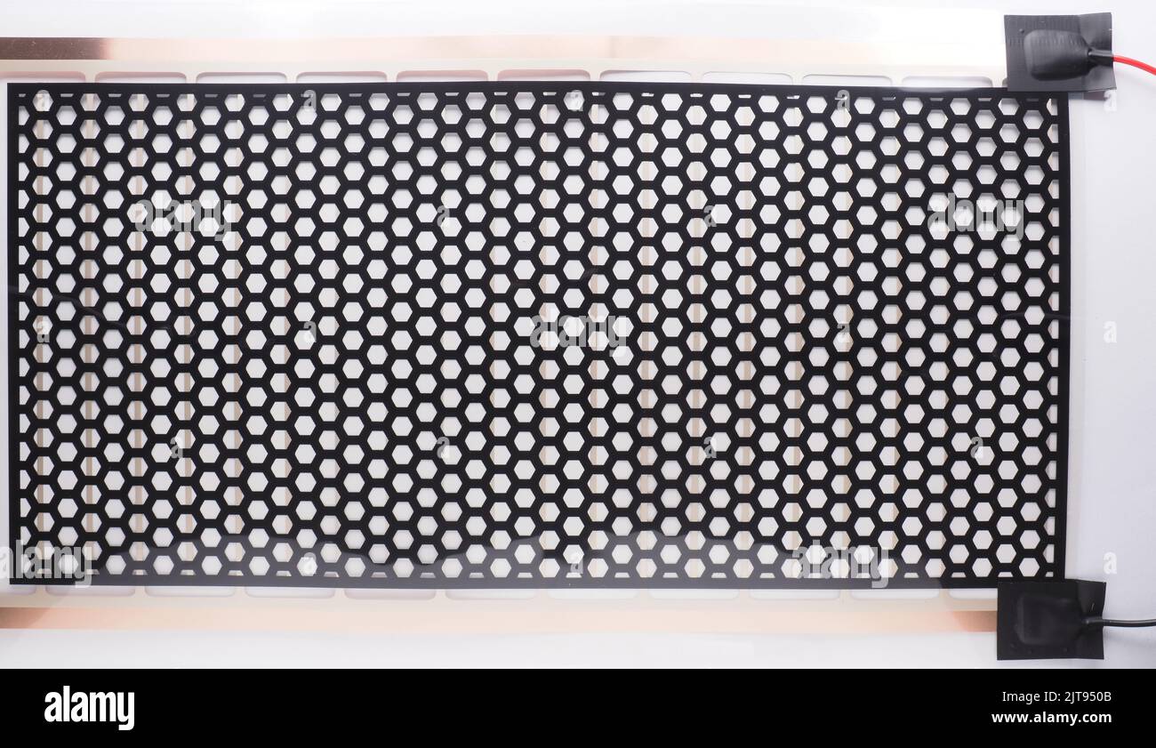 Texture of a Heating foil on a white background, alternative energy ...