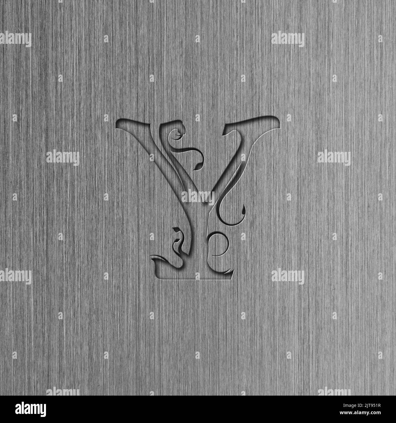 Macro shot of brushed steel with the letter Y, metal texture background ...