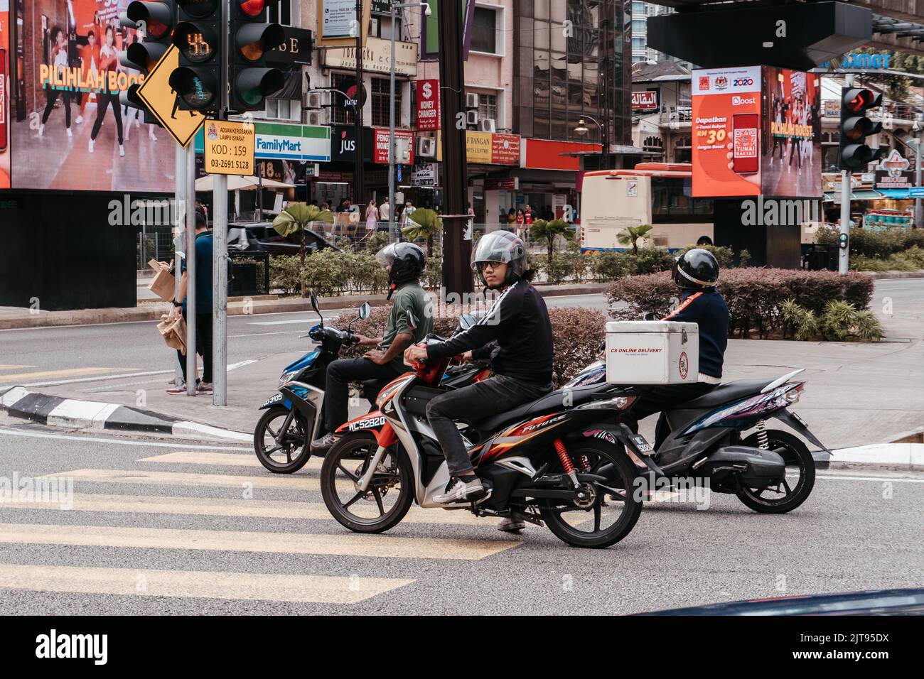 Street motorcycles surrounded buildings hi-res stock photography and ...