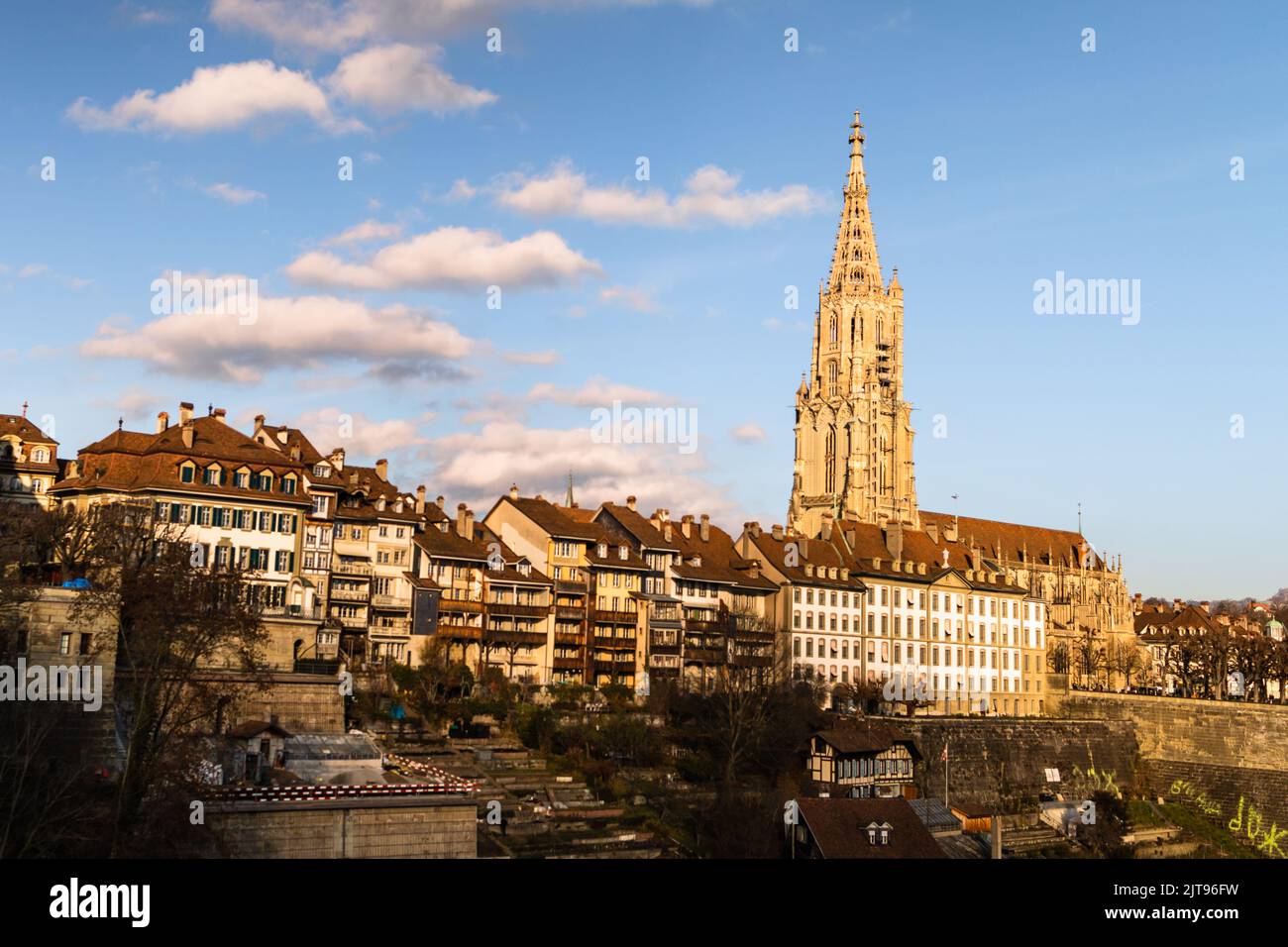 A beautiful view of the Bern Minster and the roofs of the old city on a ...