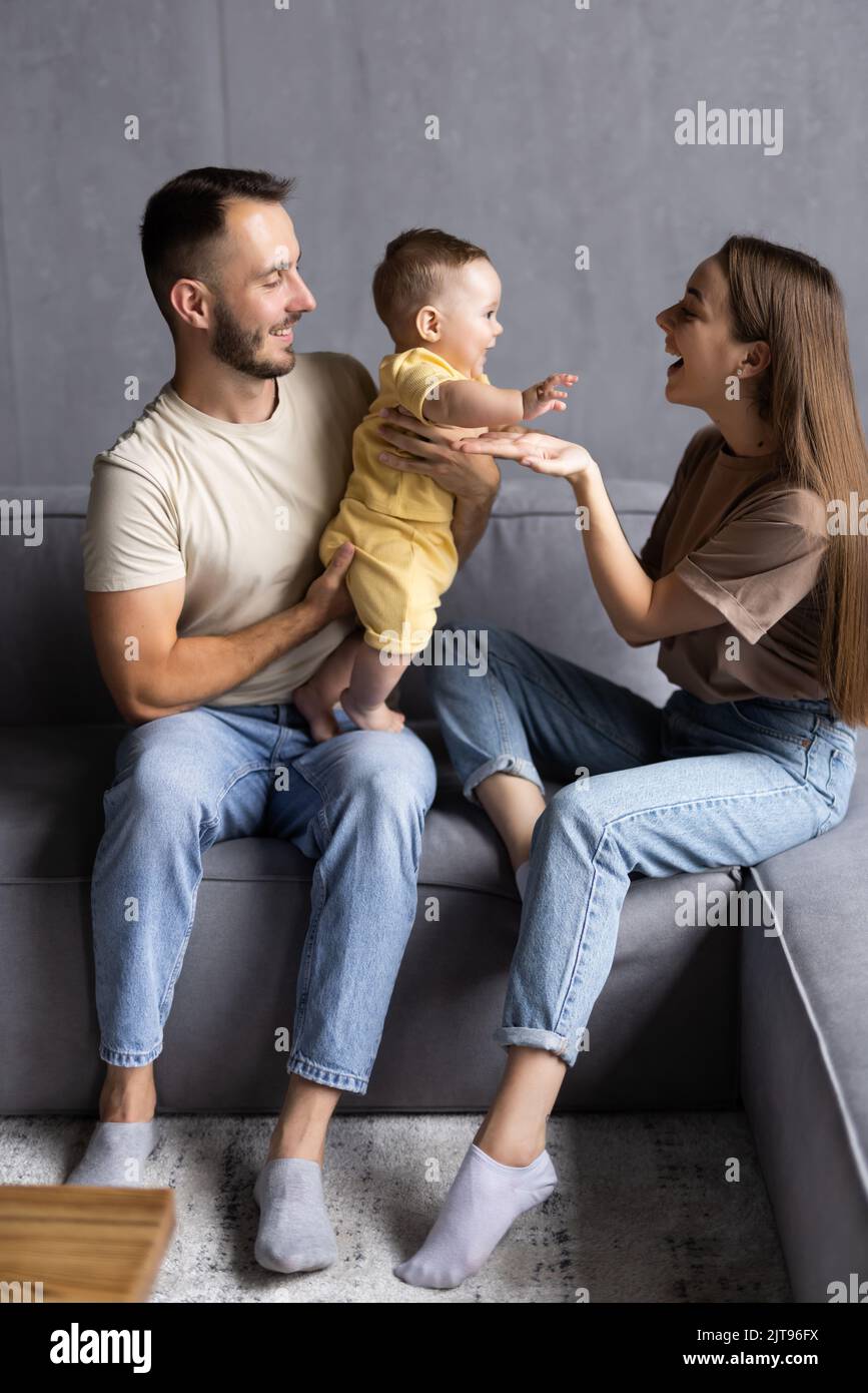 Happy family and kid son having fun at home Stock Photo - Alamy