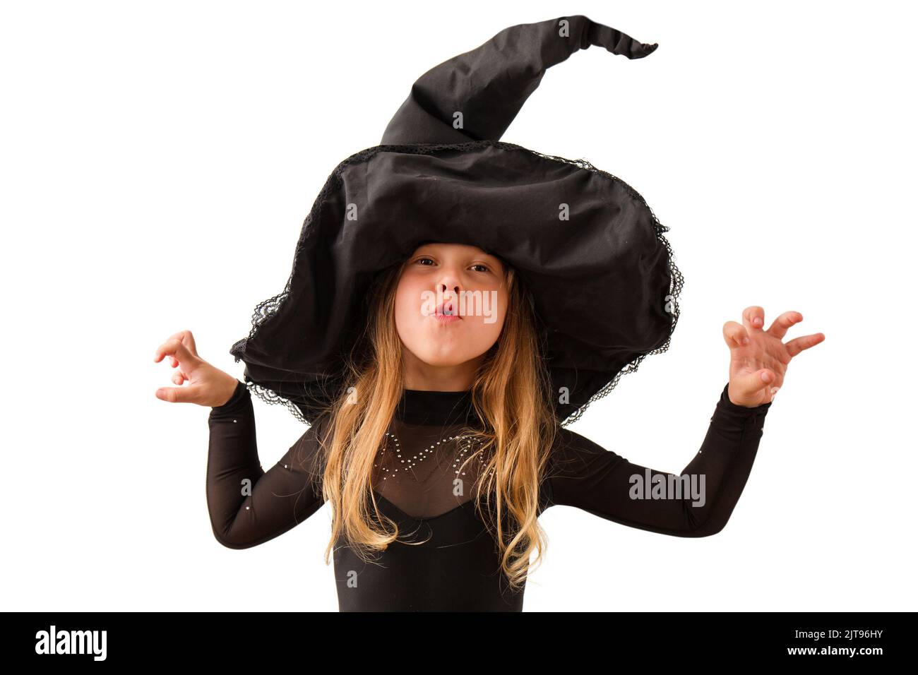 Little emotional witch in big black hat isolated on white background ...