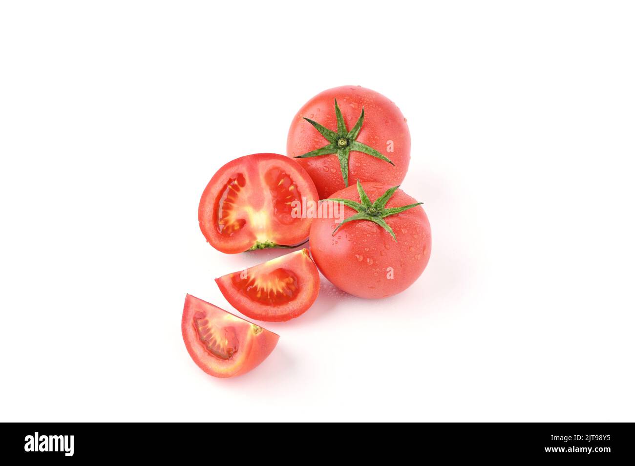 A closeup of ripe tomatoes isolated in white background Stock Photo - Alamy