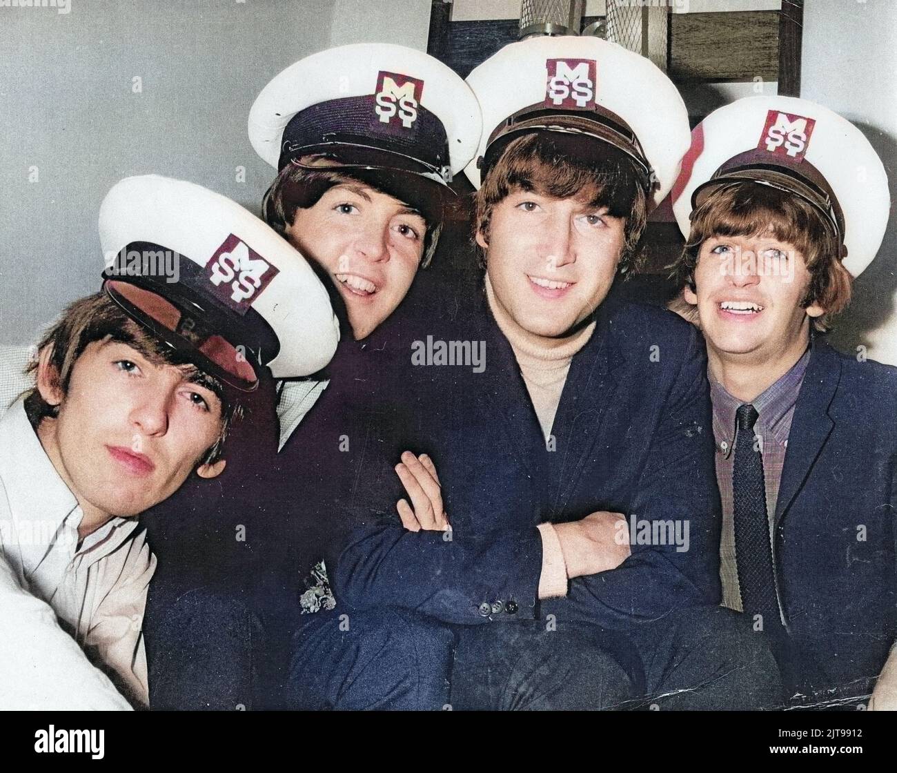 Beatles wearing caps hi-res stock photography and images - Alamy