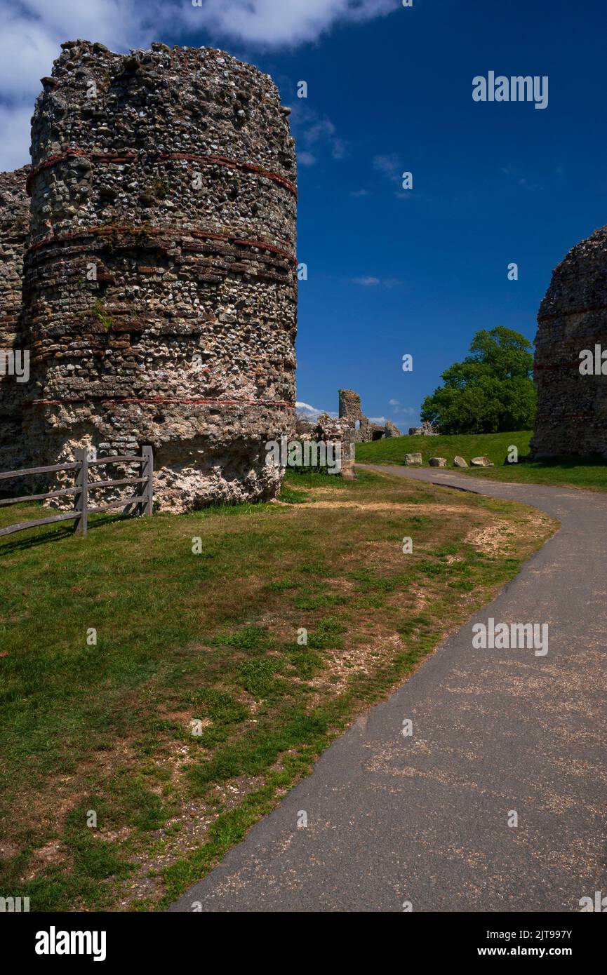 Red tiles ring the rubble core of one of the D-shaped towers guarding ...