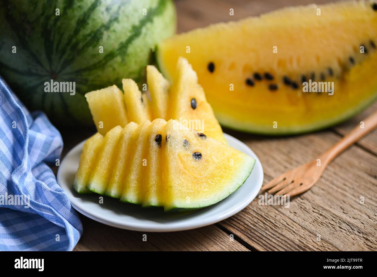 Yellow watermelon slice on white plate background, Closeup sweet ...