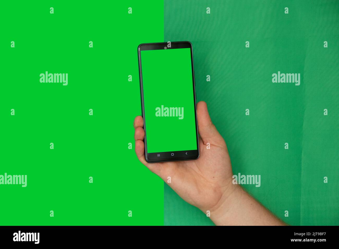 Phone hand green screen background hi-res stock photography and images ...