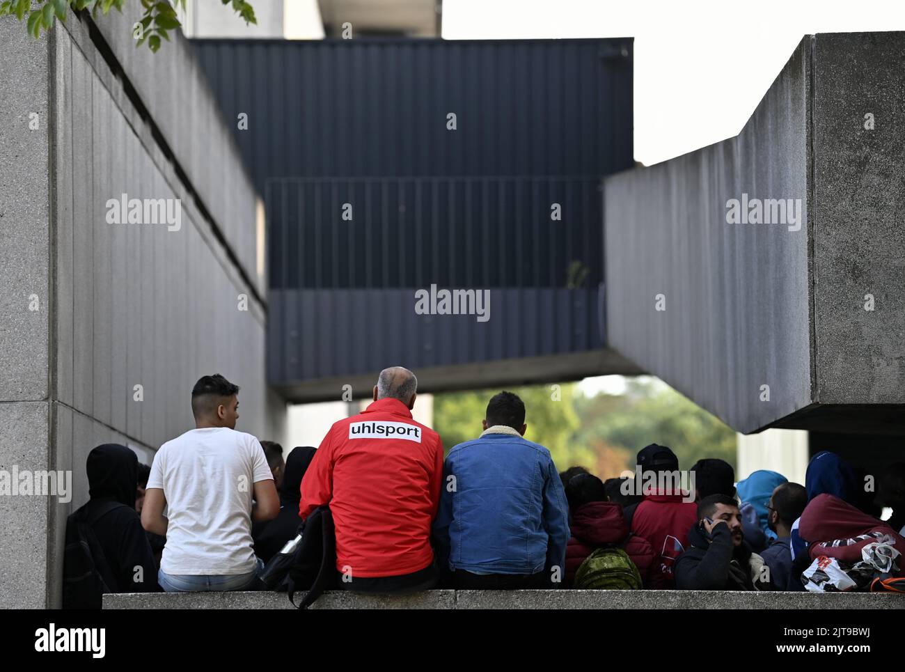 Brussels, Belgium. 29th Aug, 2022. Asylum seekers wait outside the ...