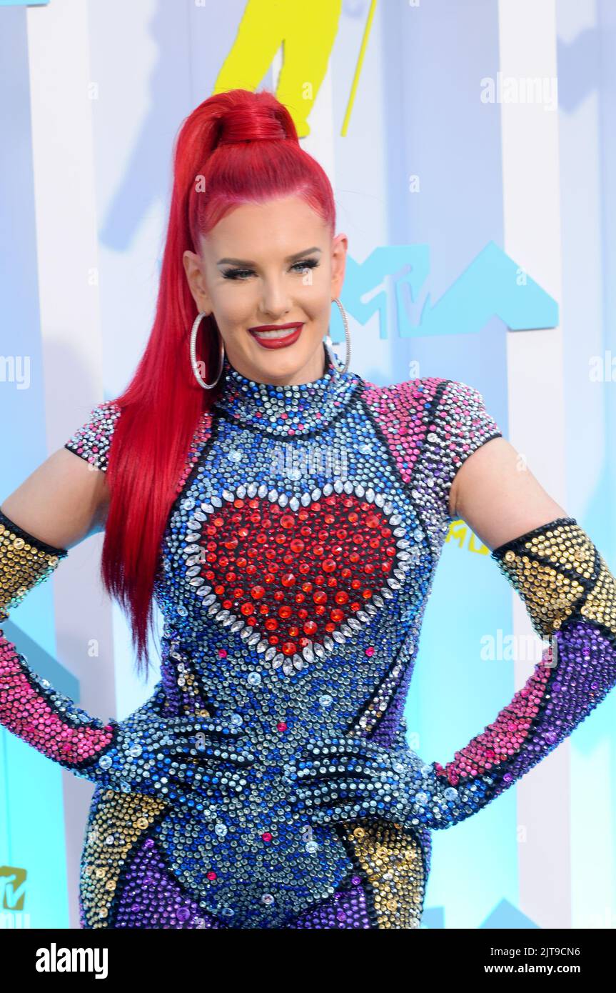 Justina Valentine walking on the black carpet at the 2022 MTV Video ...